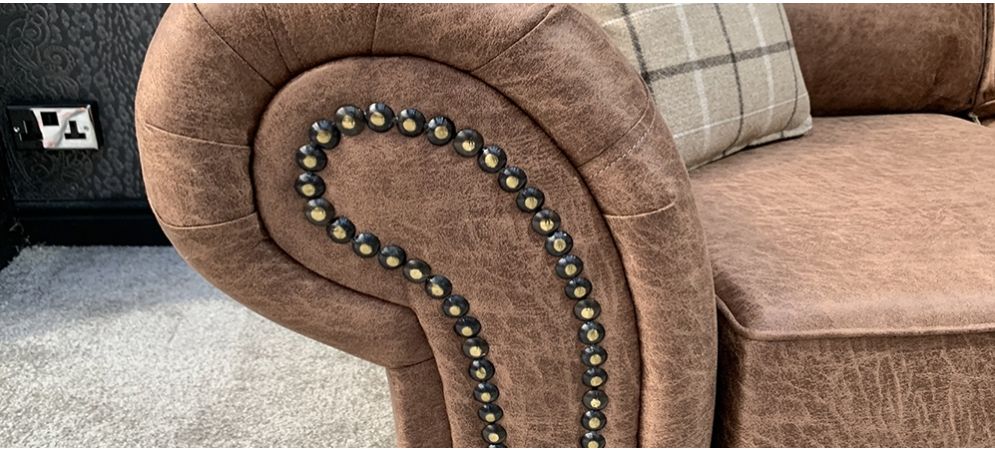 Brown studded couch store